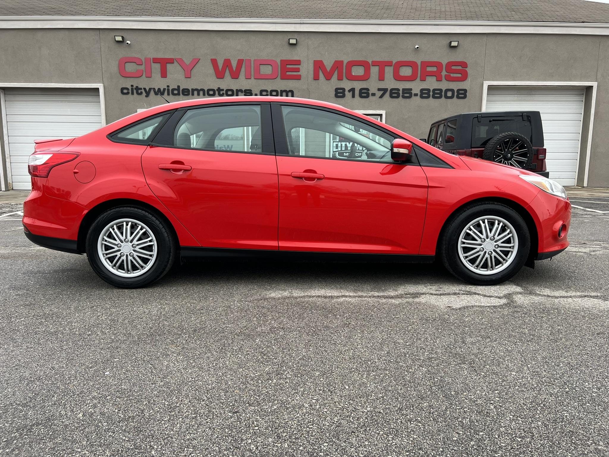 City Wide Motors - Ford - Focus [4 Door Red]
